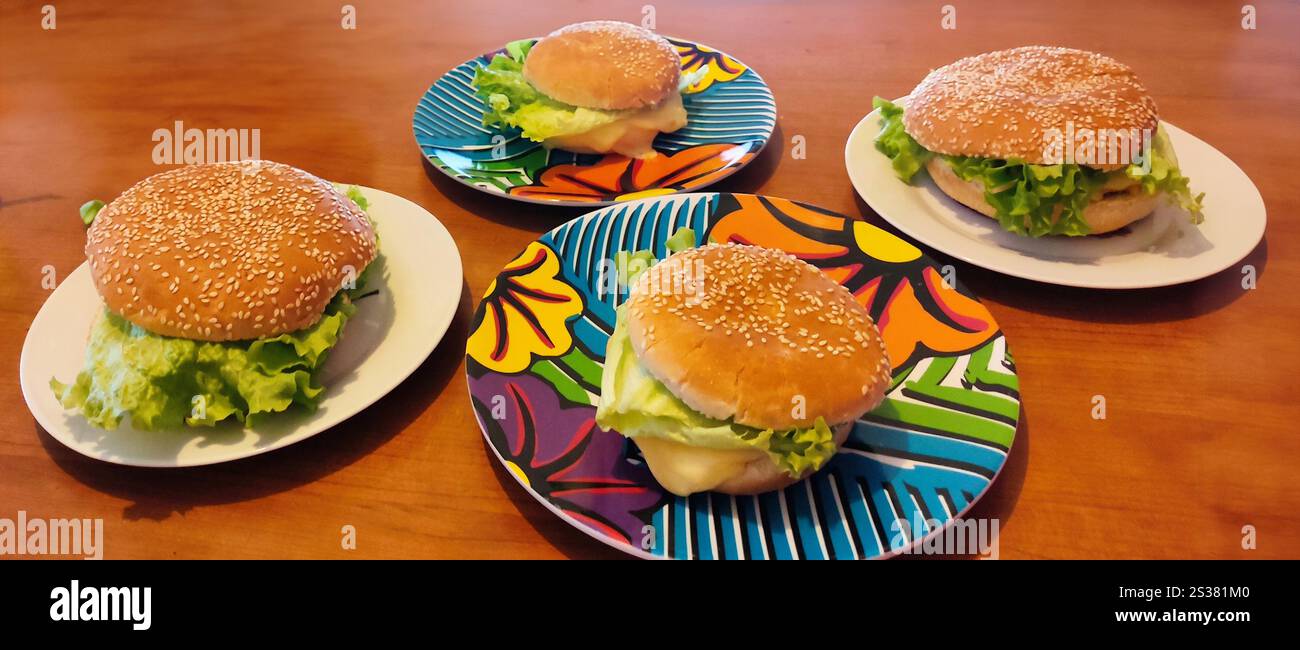 Home cooked burgers, cheeseburger and hamburger on the table. Home ...