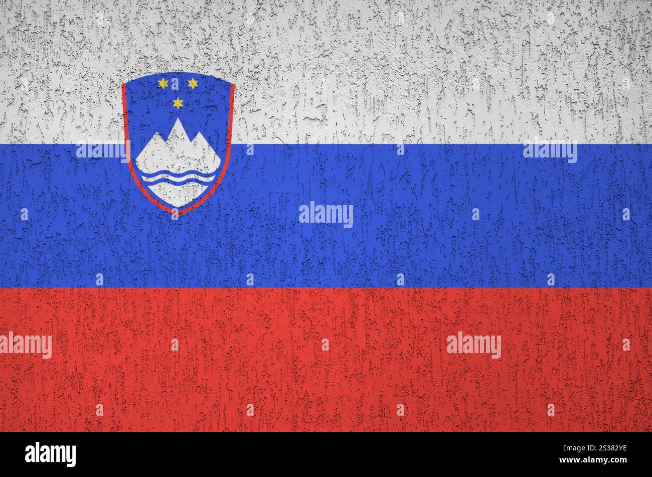 Slovenia flag depicted in bright paint colors on old relief plastering ...