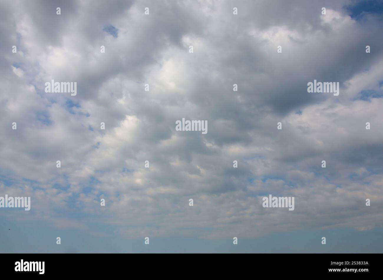 Blue sky background with white fluffy clouds in daytime outdoors ...