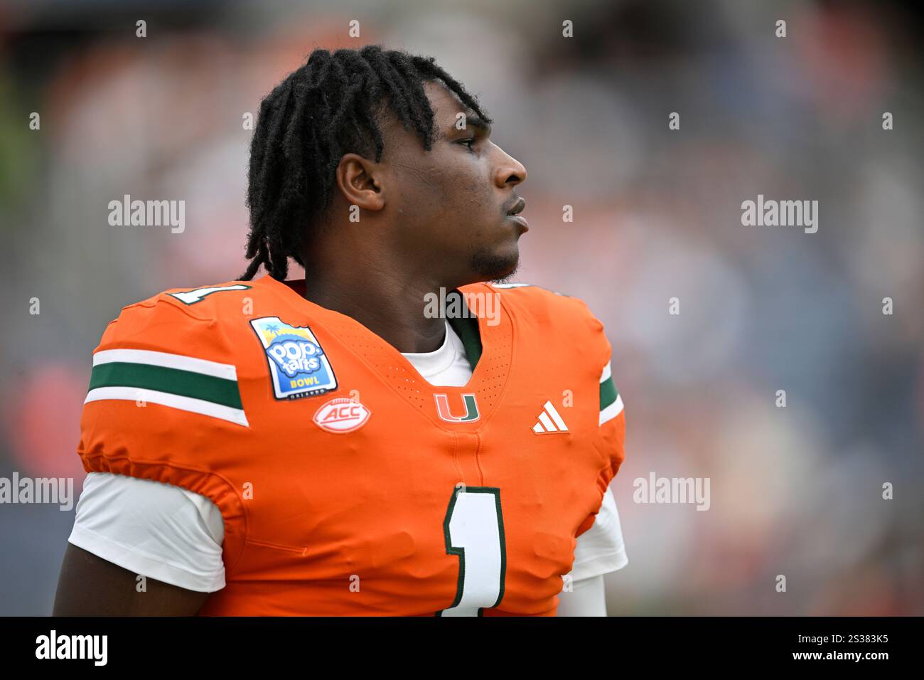 Miami quarterback Cam Ward (1) warms up before the Pop Tarts Bowl NCAA ...