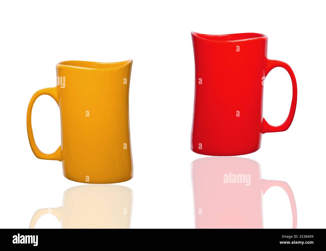 red and yellow cups isolated on white background. red and yellow cups ...