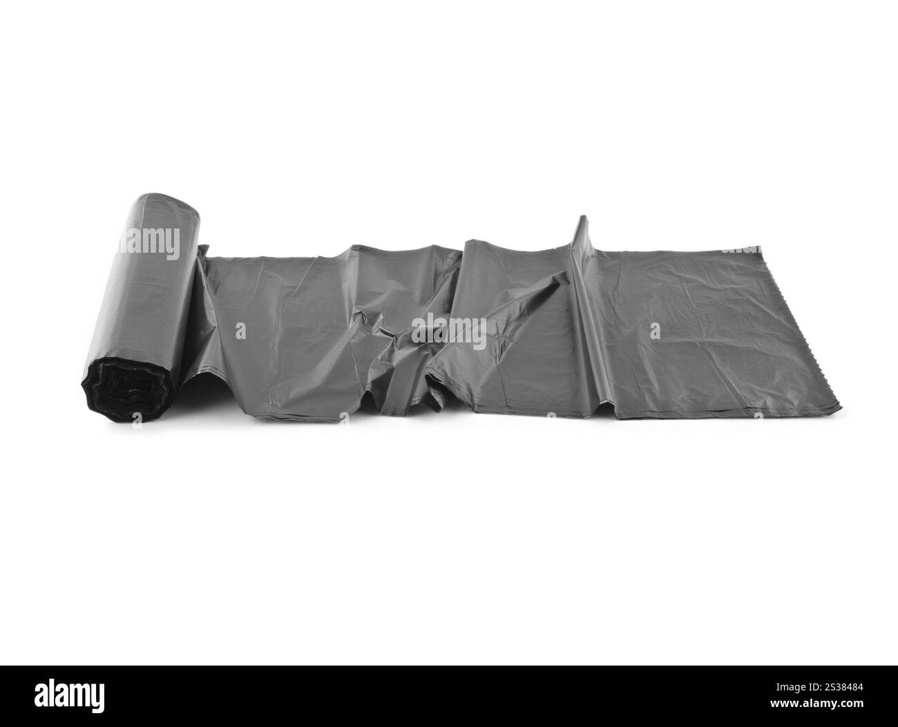 roll of black dustbin liners isolated on white background Stock Photo ...