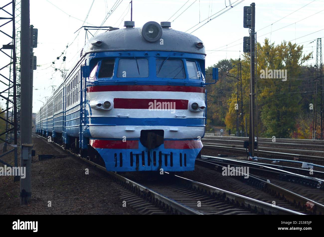Suburban electric train. Old soviet electric train with outdated design ...