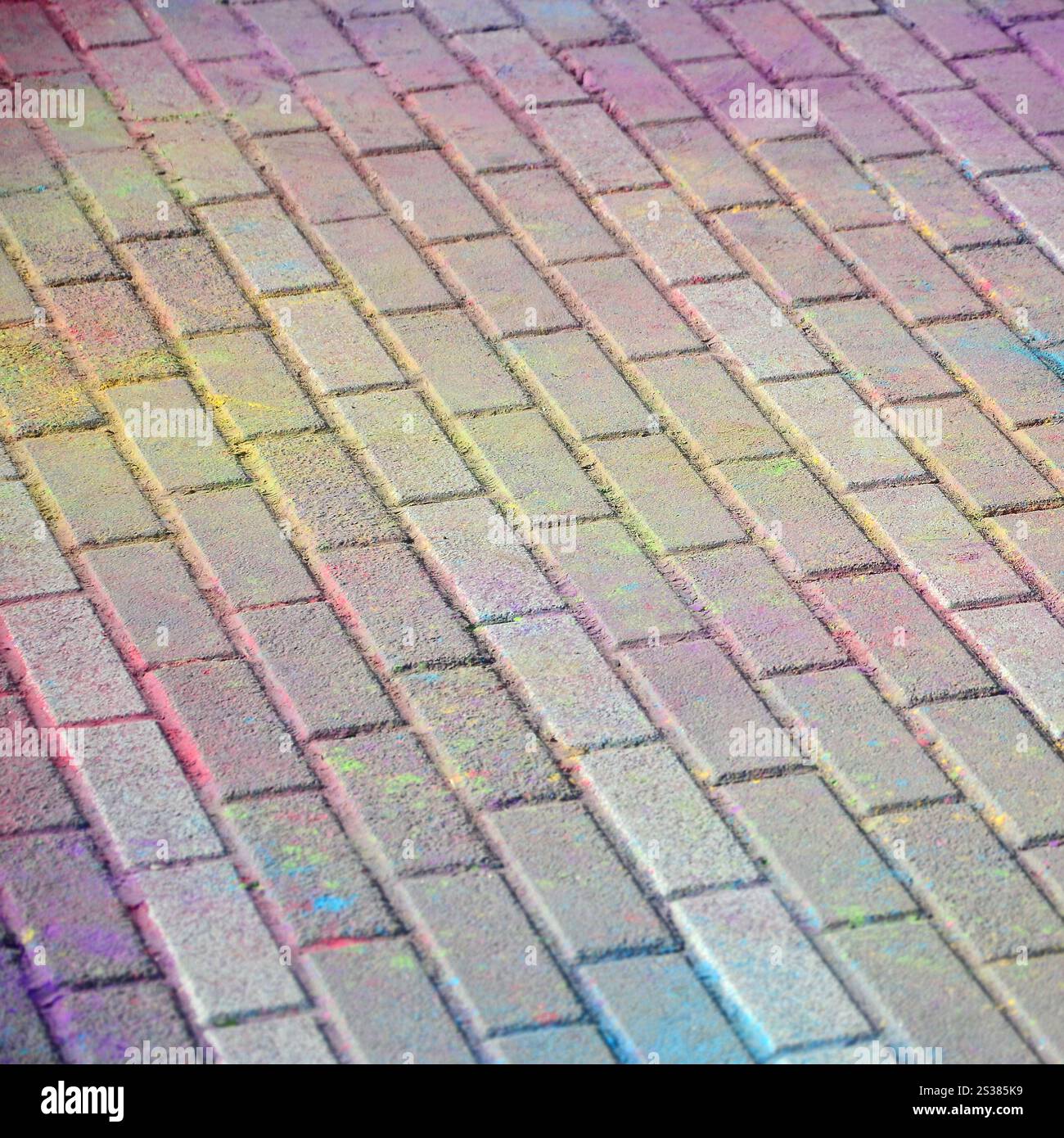 Multi colored earth, paving slabs, powder coated with dry colors at the ...