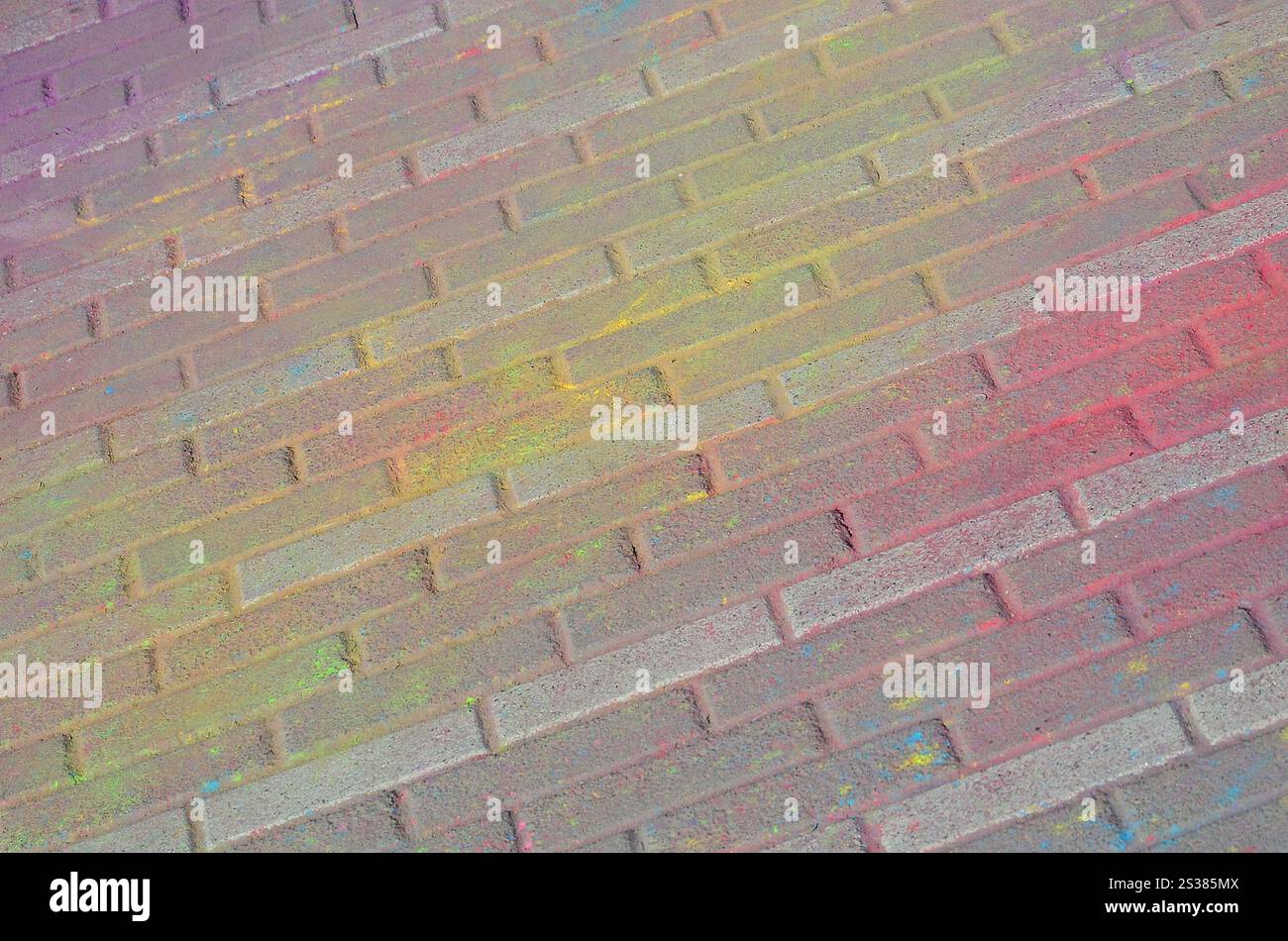 Multi colored earth, paving slabs, powder coated with dry colors at the ...