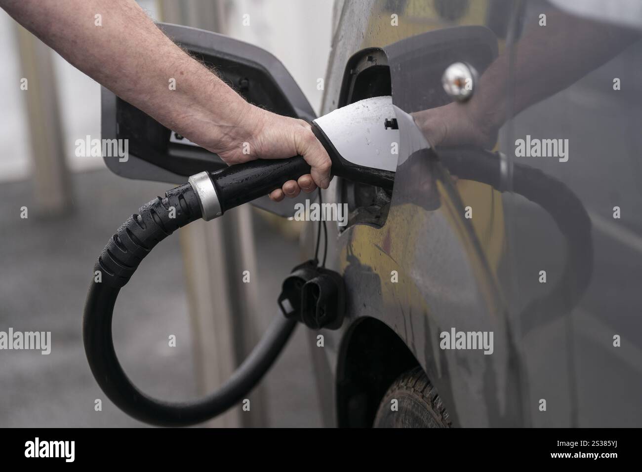 File photo dated 04/04/24 of an electric vehicle charging station at ...