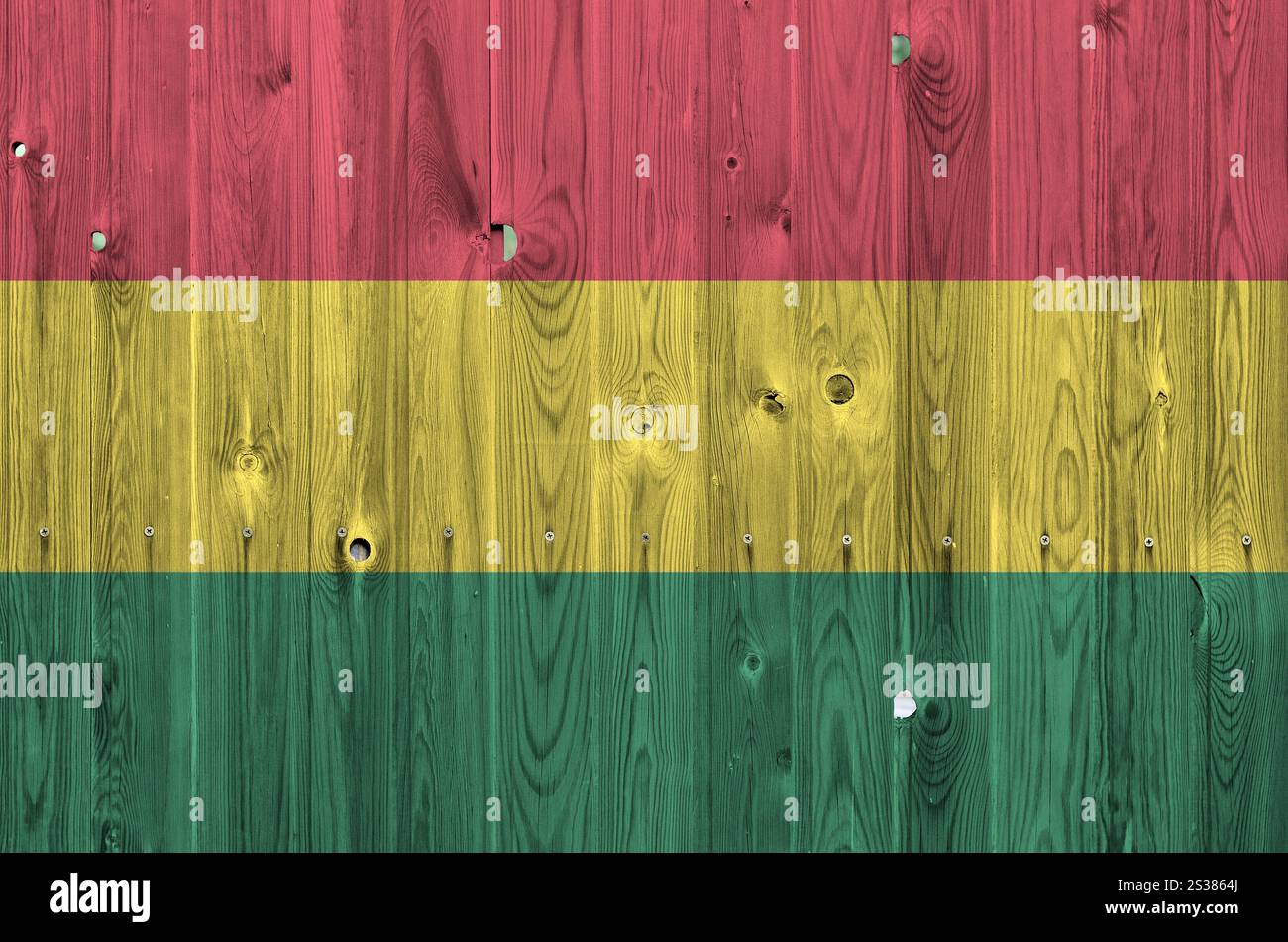 Bolivia flag depicted in bright paint colors on old wooden wall close ...