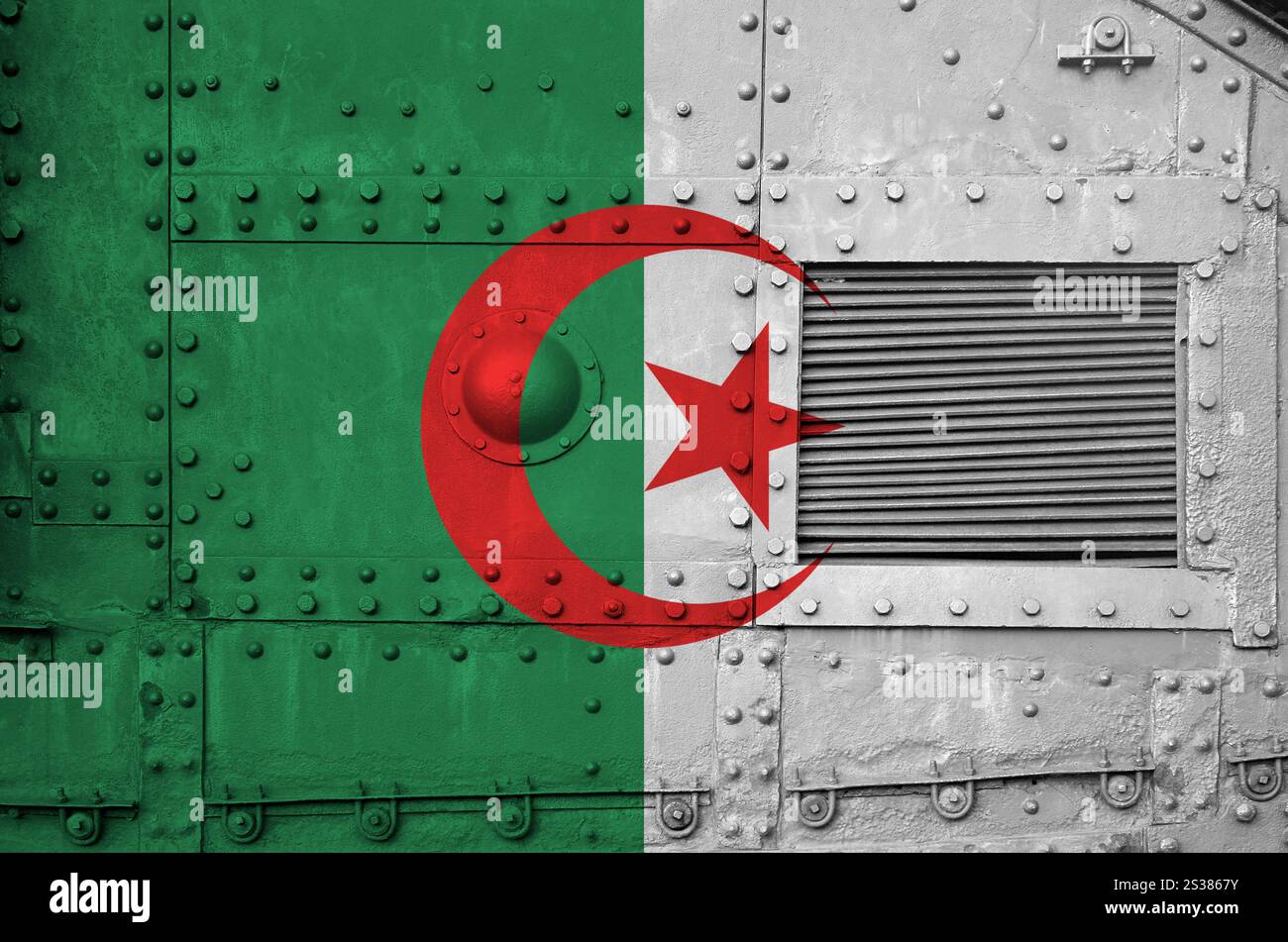 Algeria flag depicted on side part of military armored tank close up ...