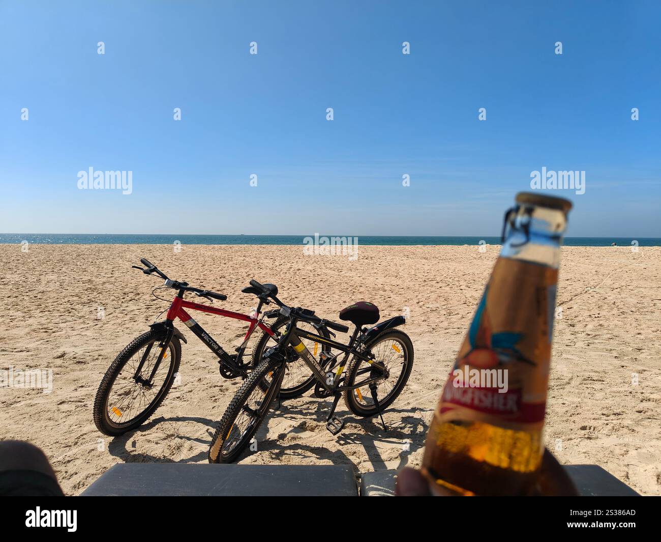 Bikes on beach Stock Photo - Alamy