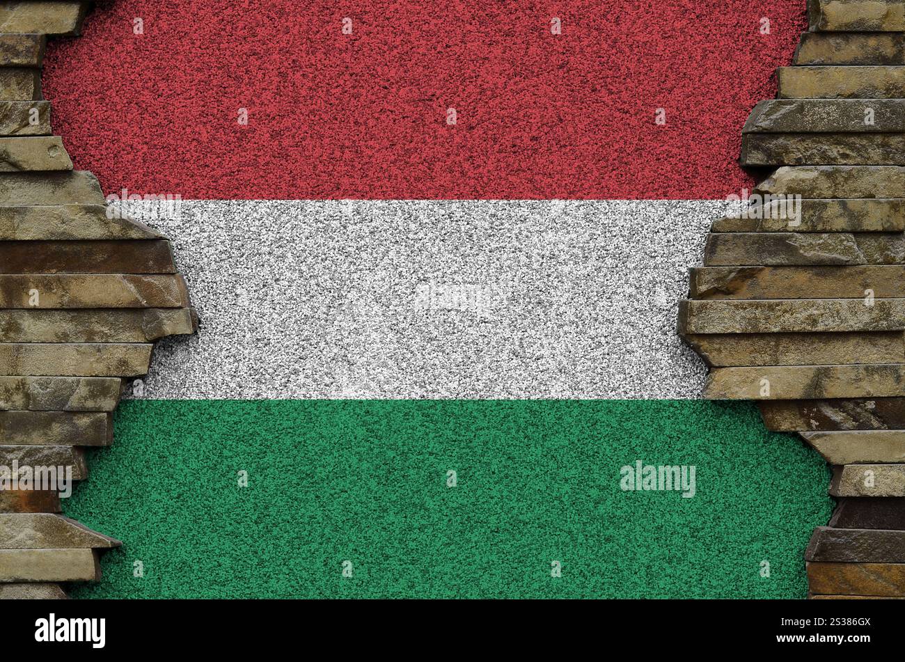 Hungary flag depicted in paint colors on old stone wall close up ...