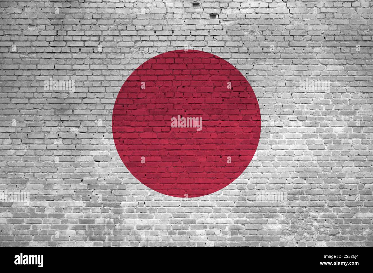 Japan flag depicted in paint colors on old brick wall close up ...