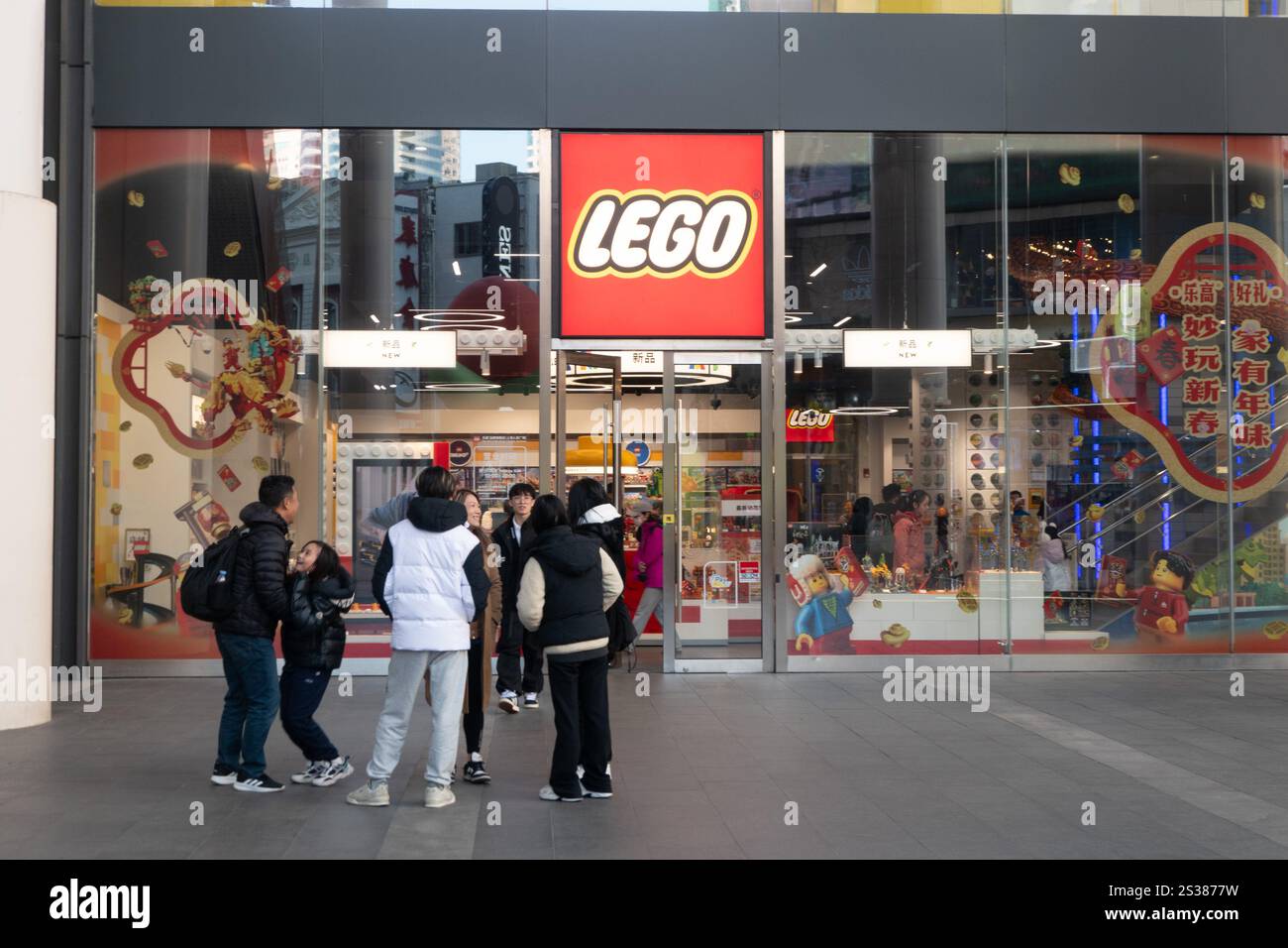 SHANGHAI, CHINA - JANUARY 9, 2025 - Citizens walk past the flagship ...