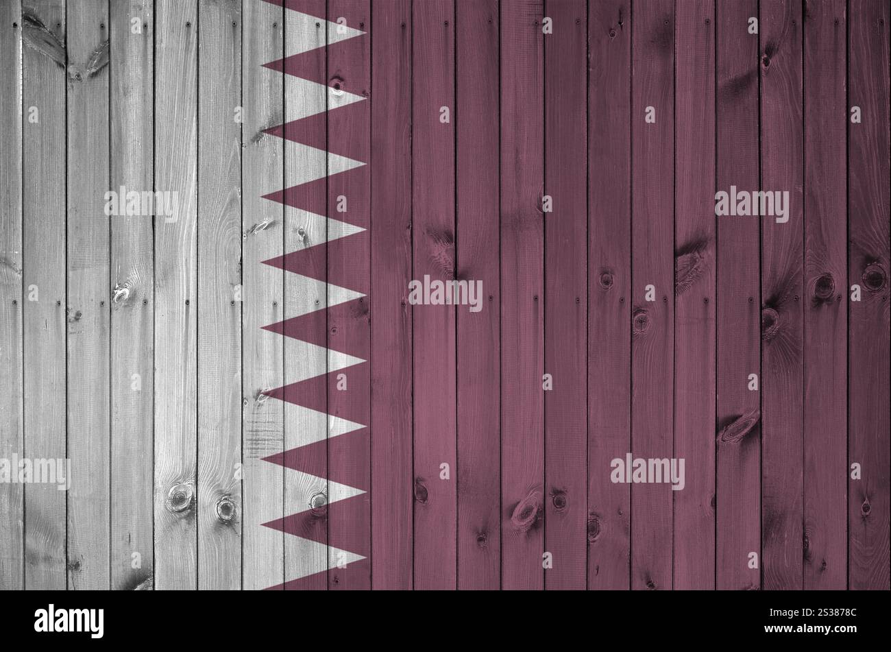 Qatar flag depicted in bright paint colors on old wooden wall close up ...