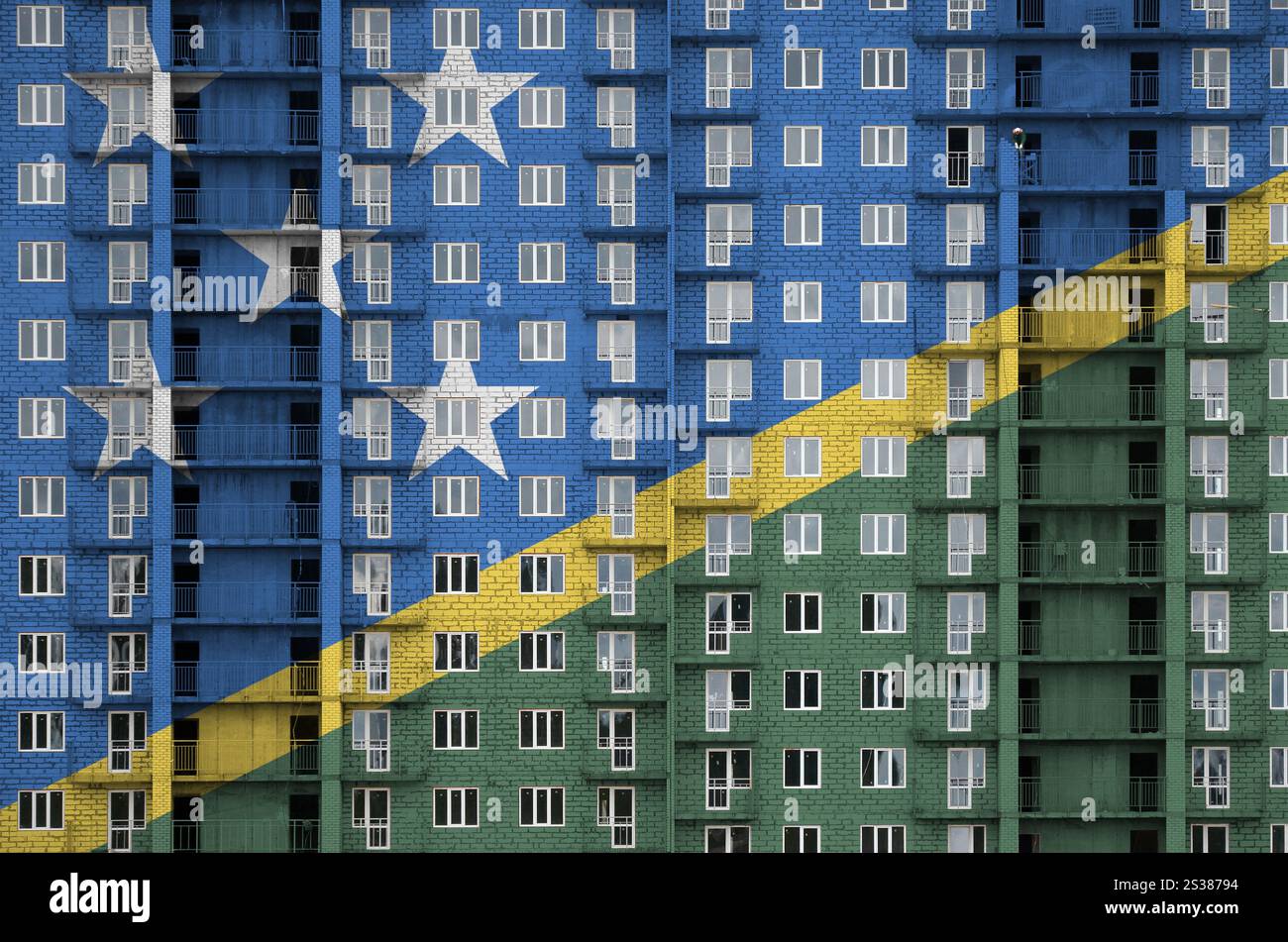 Solomon Islands flag depicted in paint colors on multi-storey ...