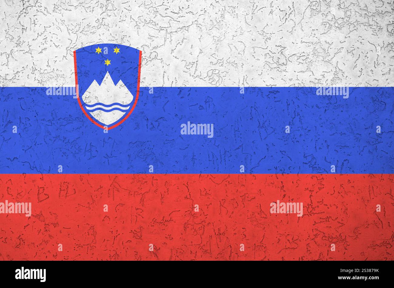 Slovenia flag depicted in bright paint colors on old relief plastering ...