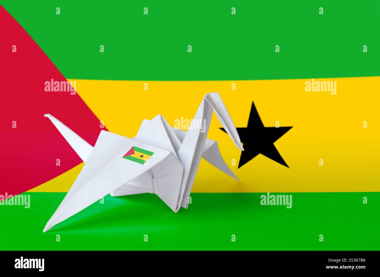 Sao Tome and Principe flag depicted on paper origami crane wing ...