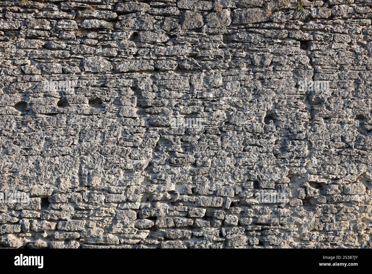 Very old brick stone wall of castle or fortress of 18th century. Full ...