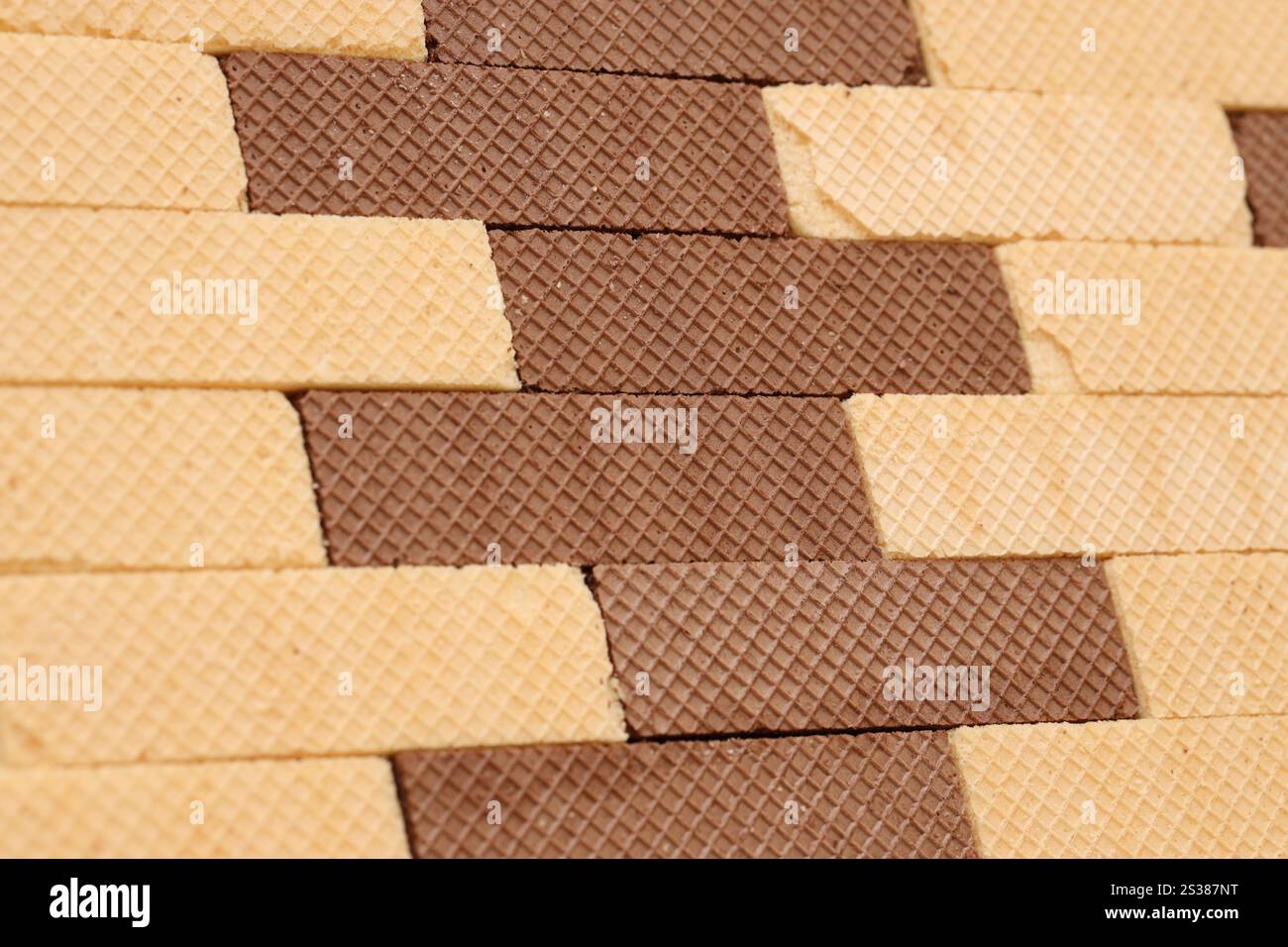 Stacked delicious chocolate wafers in large amount. Two different ...