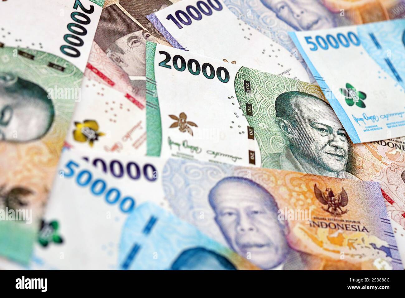 Background image of many indonesian rupiah money bills of new series ...