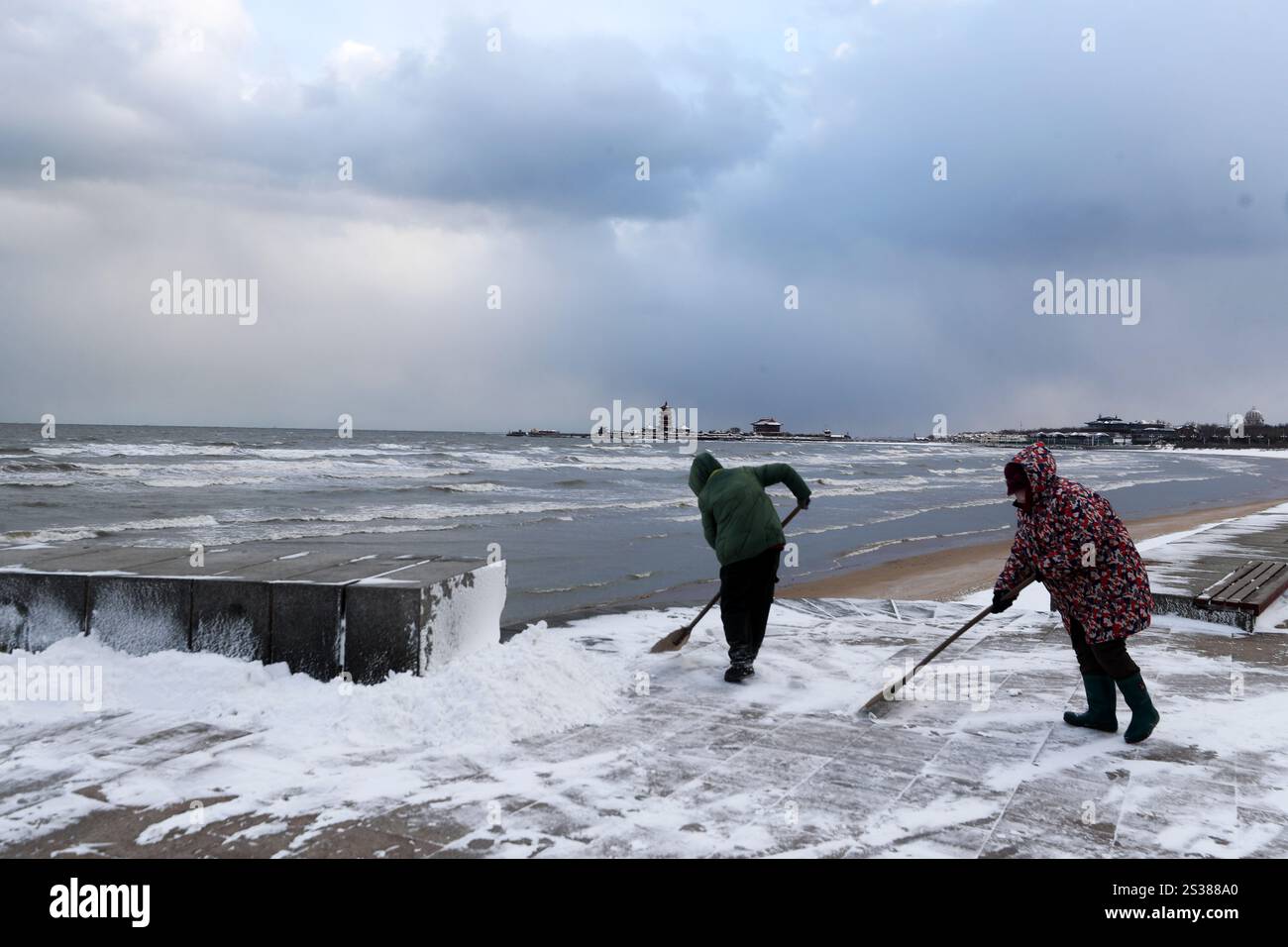 YANTAI, CHINA - JANUARY 9, 2025 - Residents clean up snow in Yantai ...