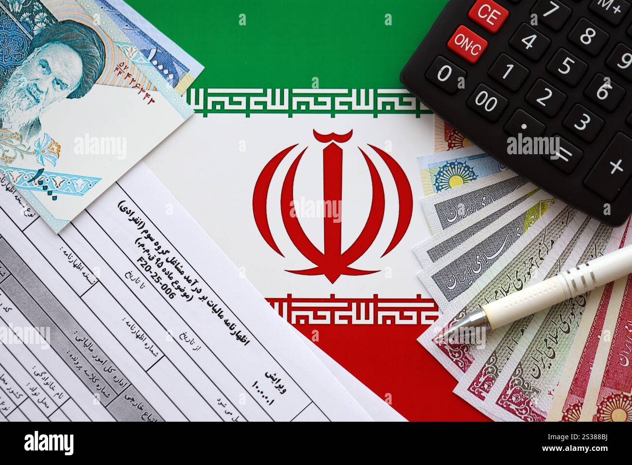 Iranian annual income tax return form F20-25-006 ready to fill on table ...