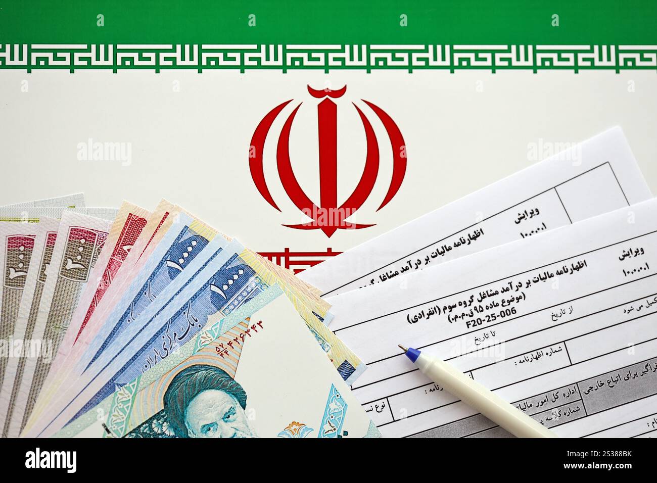 Iranian annual income tax return form F20-25-006 ready to fill on table ...