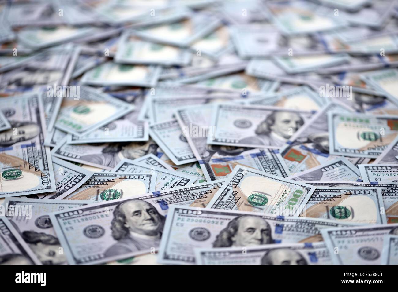 Very big amount of US hundred dollar bills close up. Huge quantity of ...