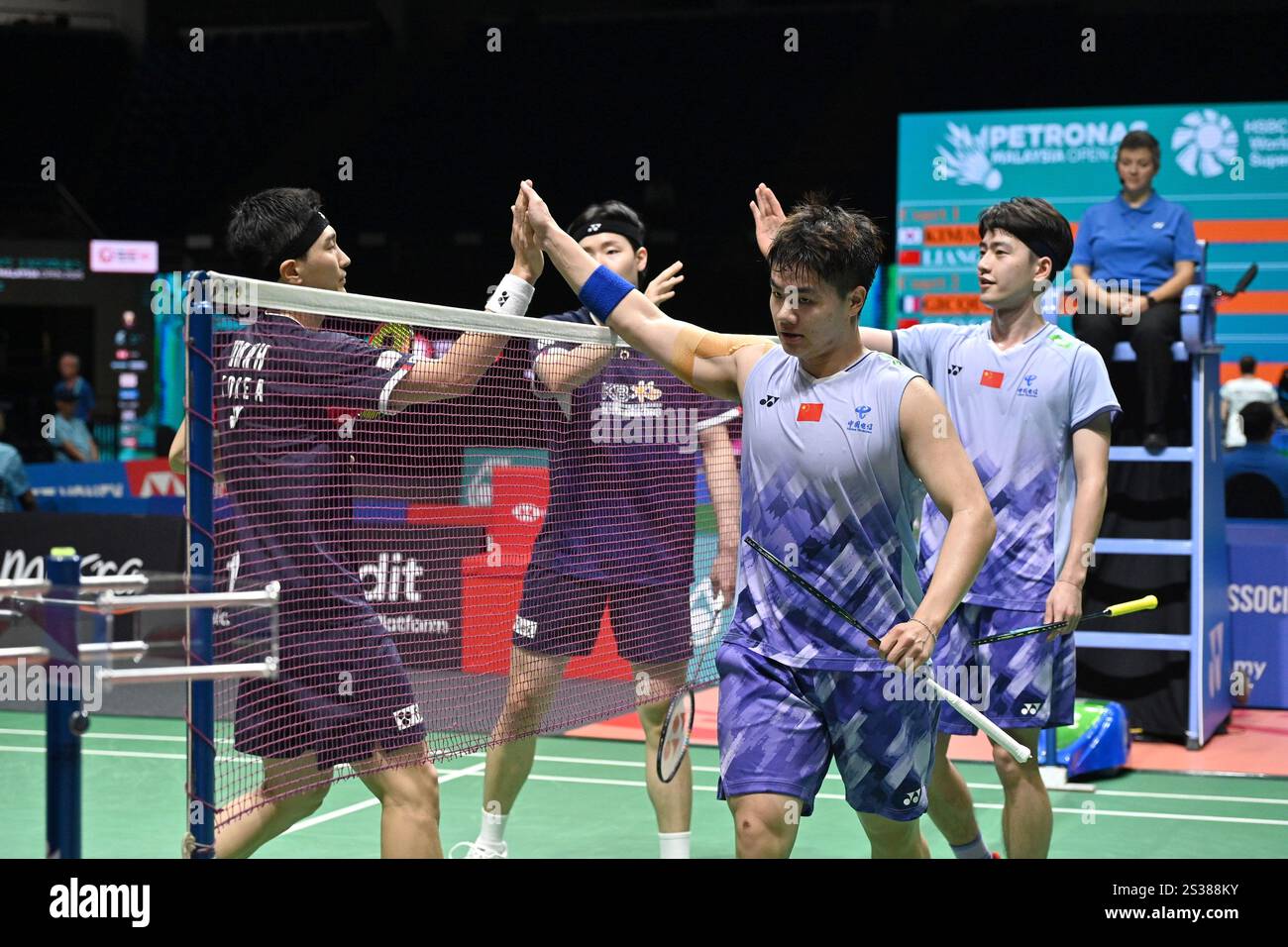 Kuala Lumpur, Malaysia. 9th Jan, 2025. Liang Weikeng (3rd, R)/Wang Chang (2nd, R) of China greet ...