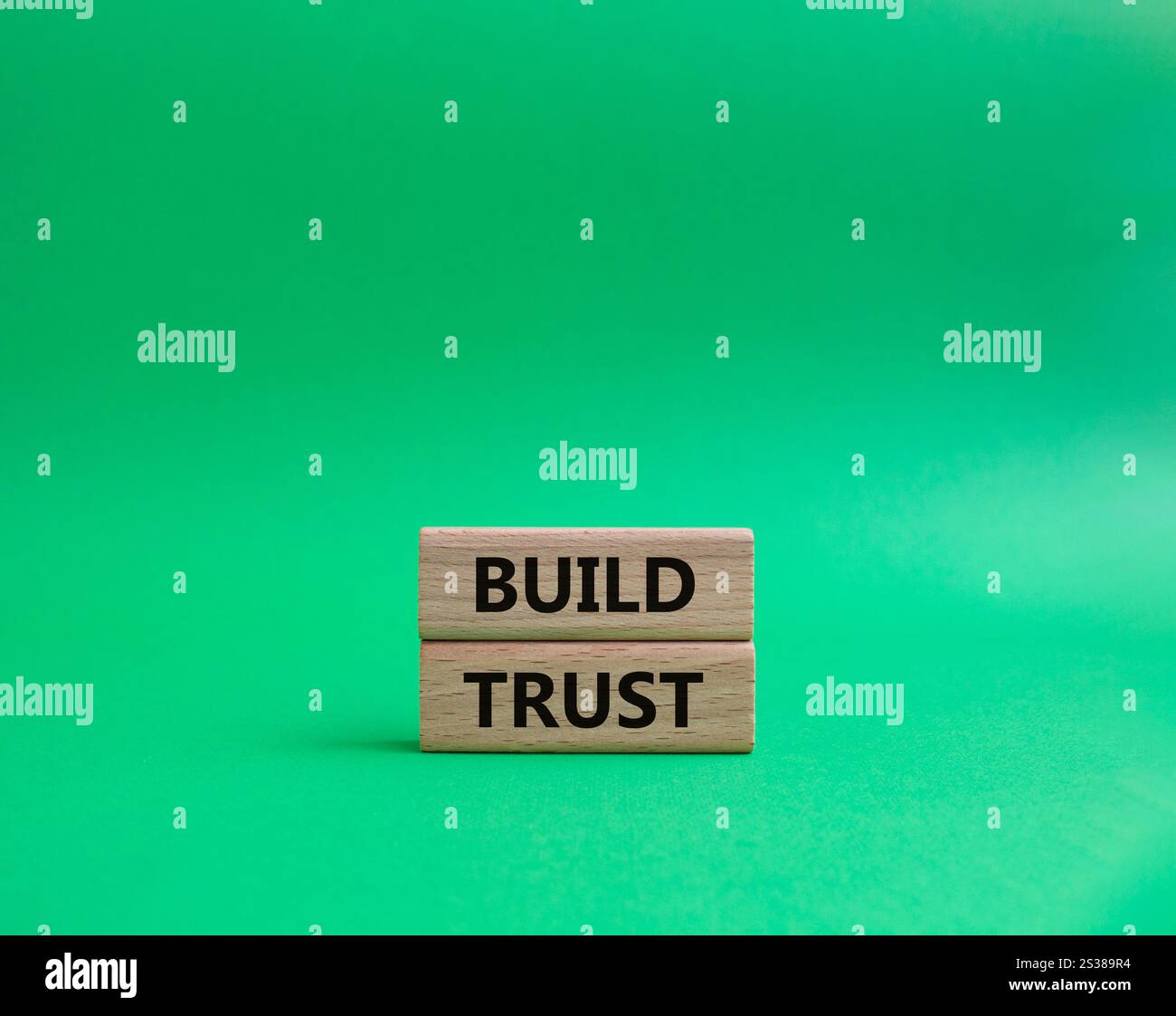 Build trust symbol. Wooden blocks with words Build trust. Beautiful ...