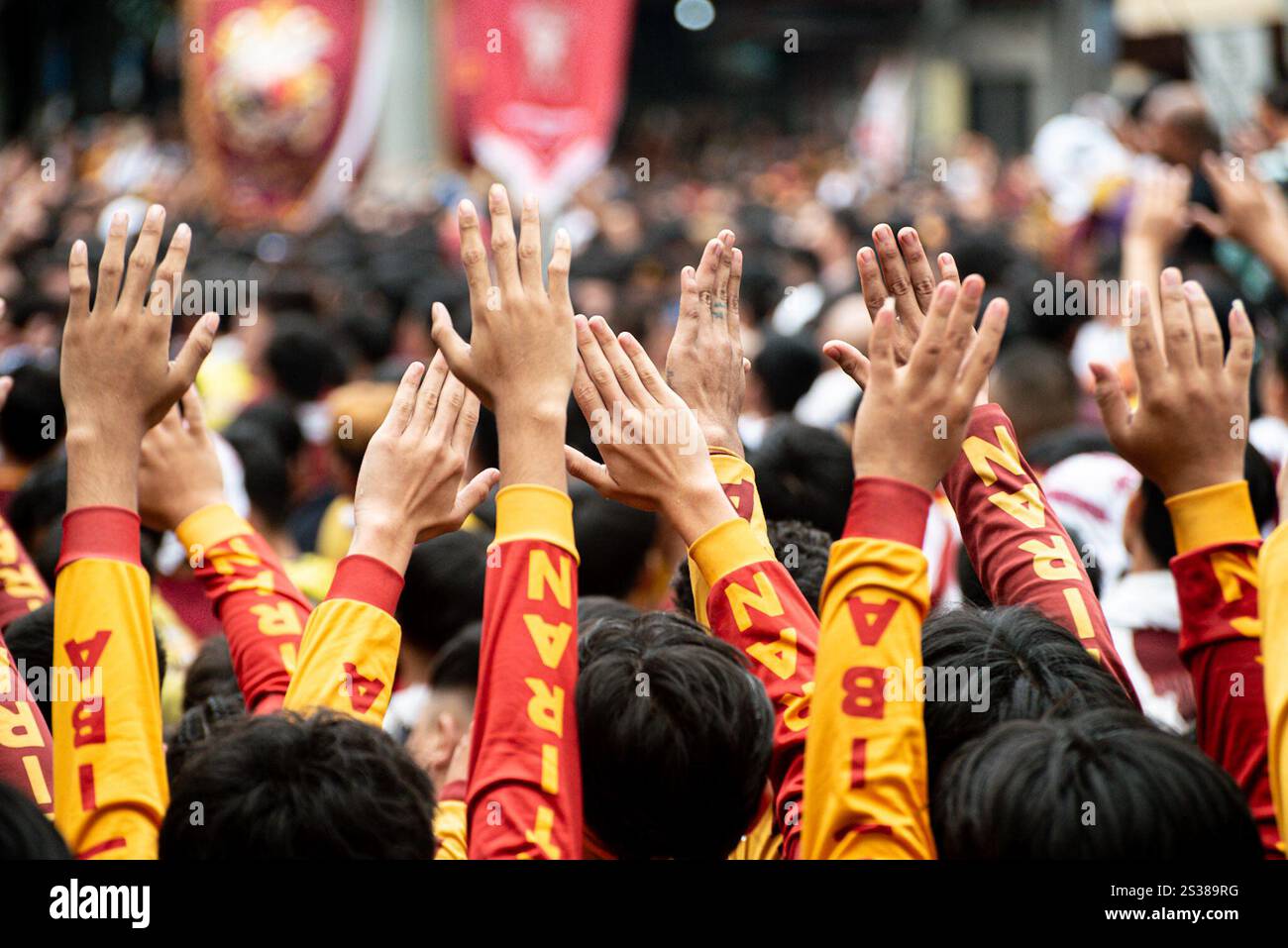 January 9, 2025, Manila, Philippines: Catholic devotees raises their ...