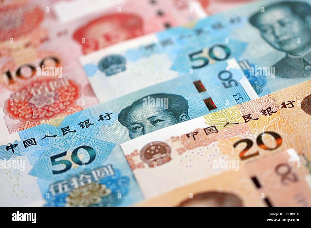 Many money bills of People Republic of China. PRC Yuan banknotes close ...