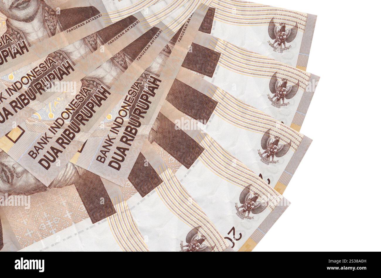 2000 Indonesian rupiah bills lies isolated on white background with ...