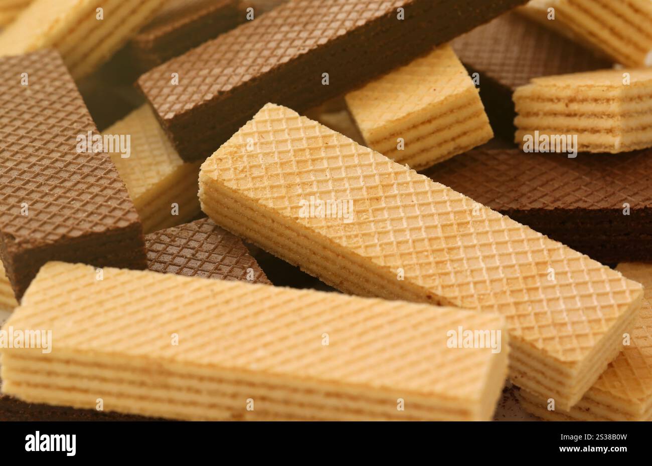 Stacked delicious chocolate wafers in large amount. Two different ...