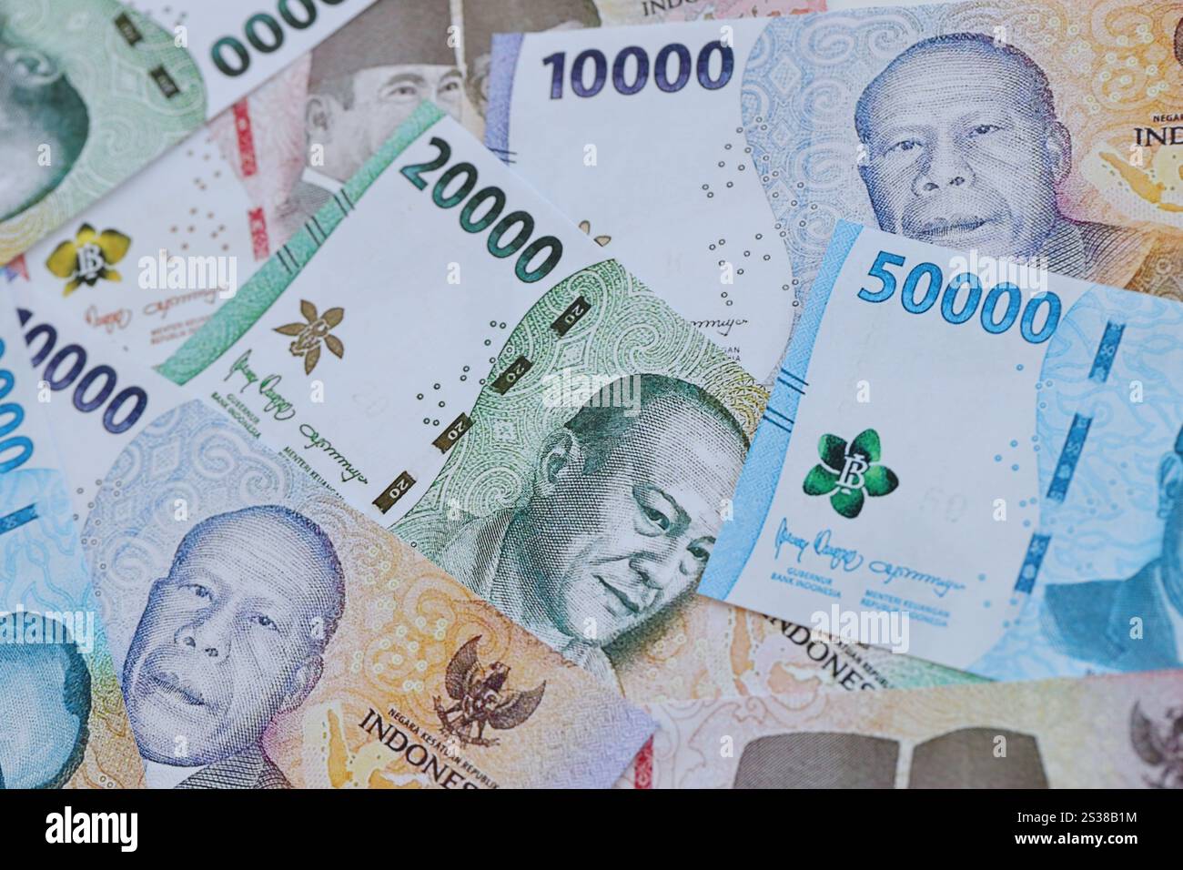 Background image of many indonesian rupiah money bills of new series ...