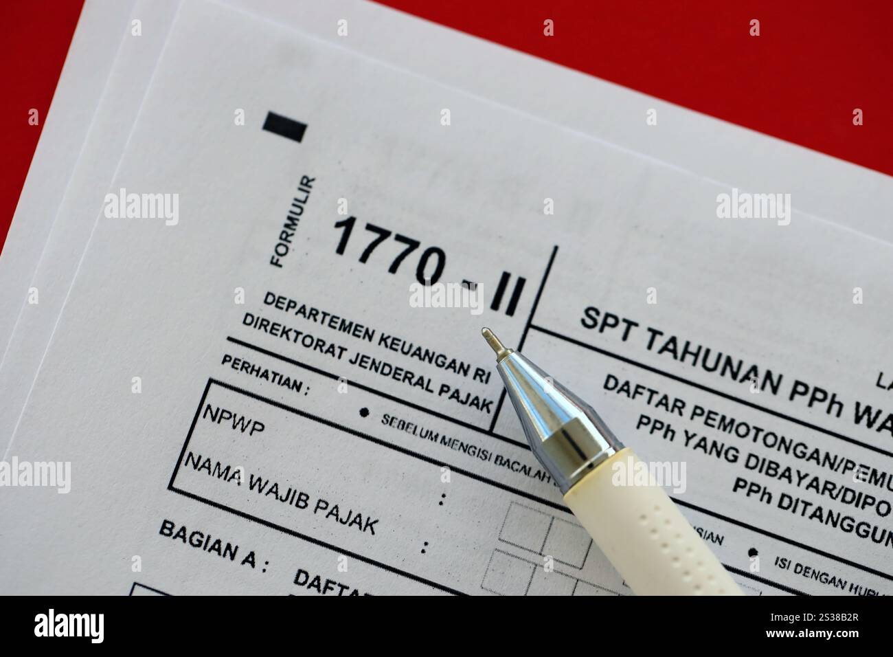 Indonesian tax form 1770-2 Individual Income Tax Return and pen on ...