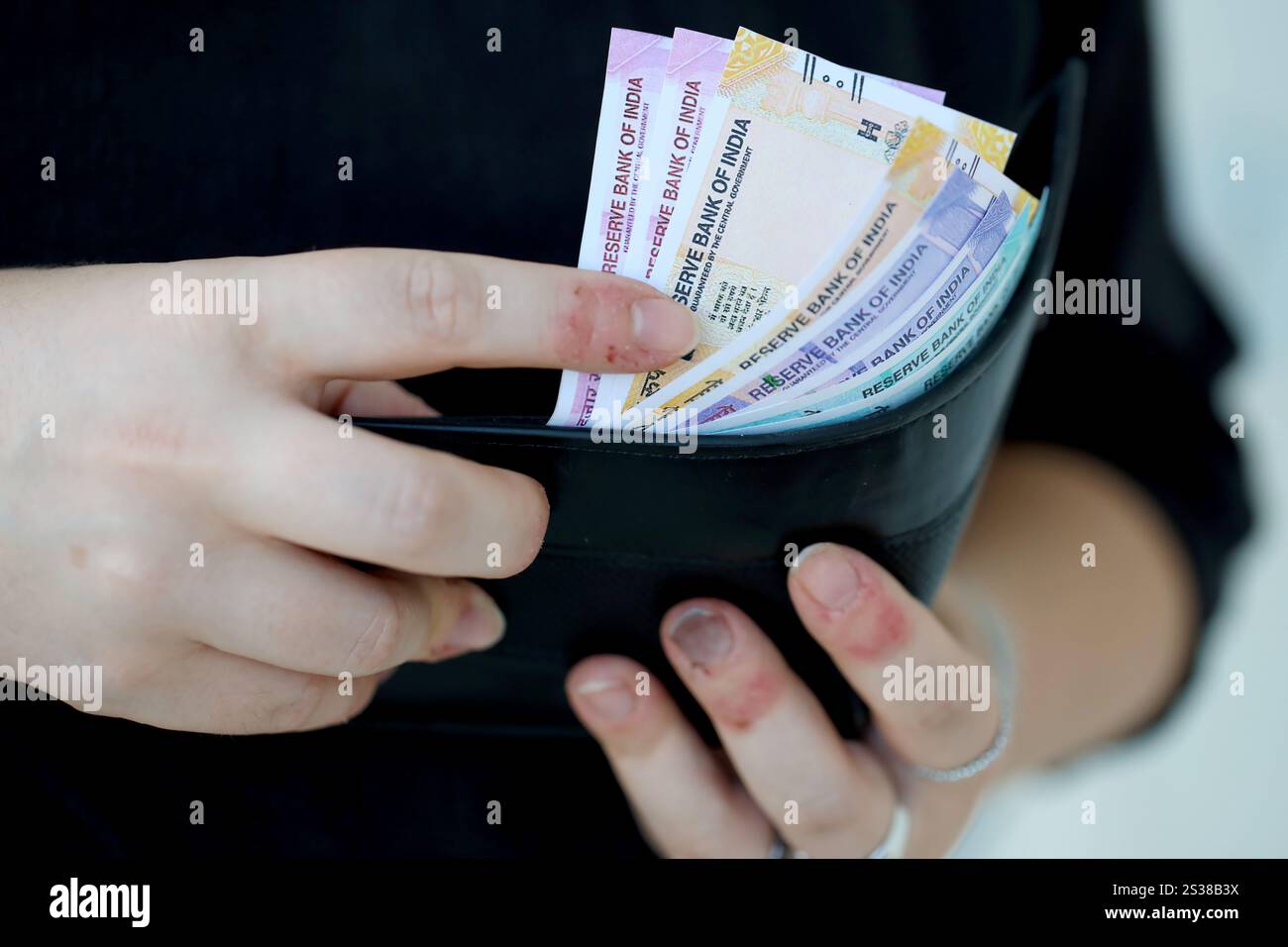 Woman hand with indian rupees bills close up. Concept of financial ...