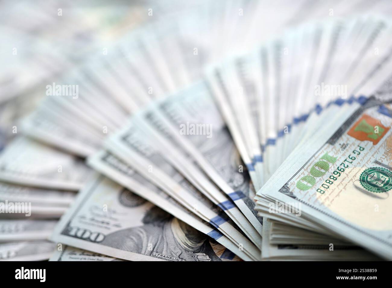 Very big amount of US hundred dollar bills close up. Huge quantity of ...