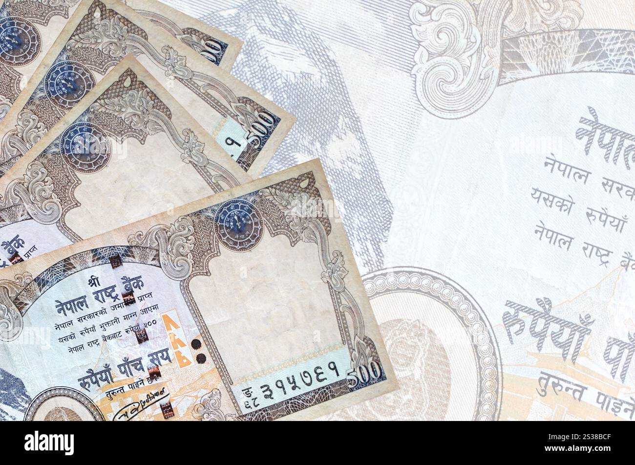 500 Nepalese rupees bills lies in stack on background of big semi ...