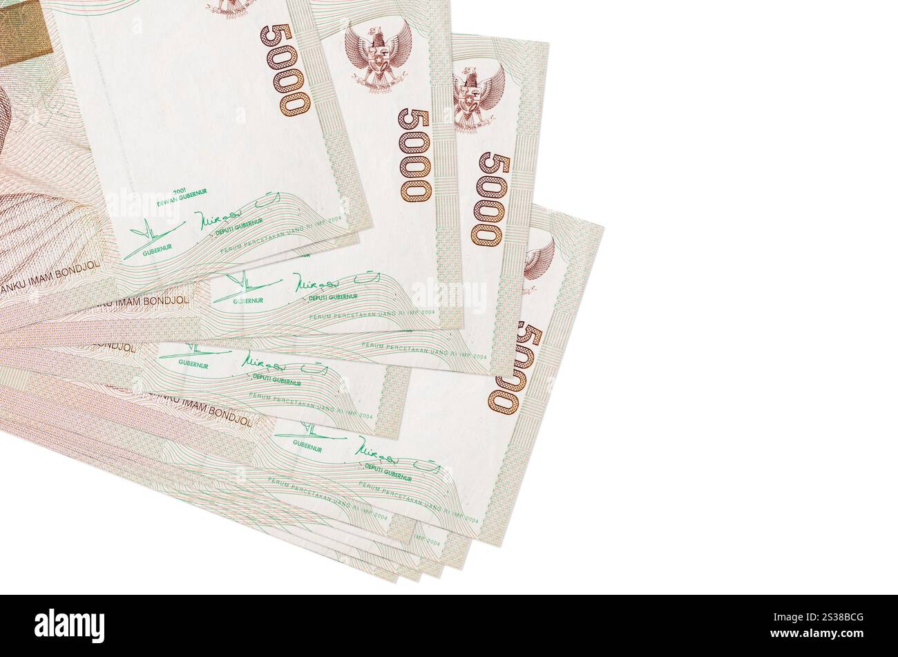 5000 Indonesian rupiah bills lies in small bunch or pack isolated on ...