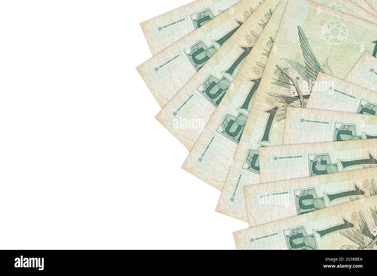 1 Brazilian real bills lies isolated on white background with copy ...