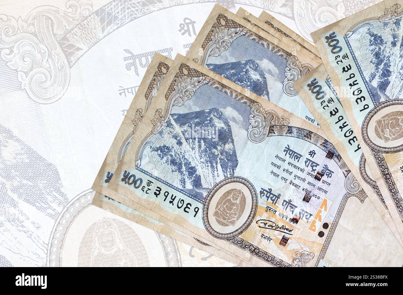 500 Nepalese rupees bills lies in stack on background of big semi ...