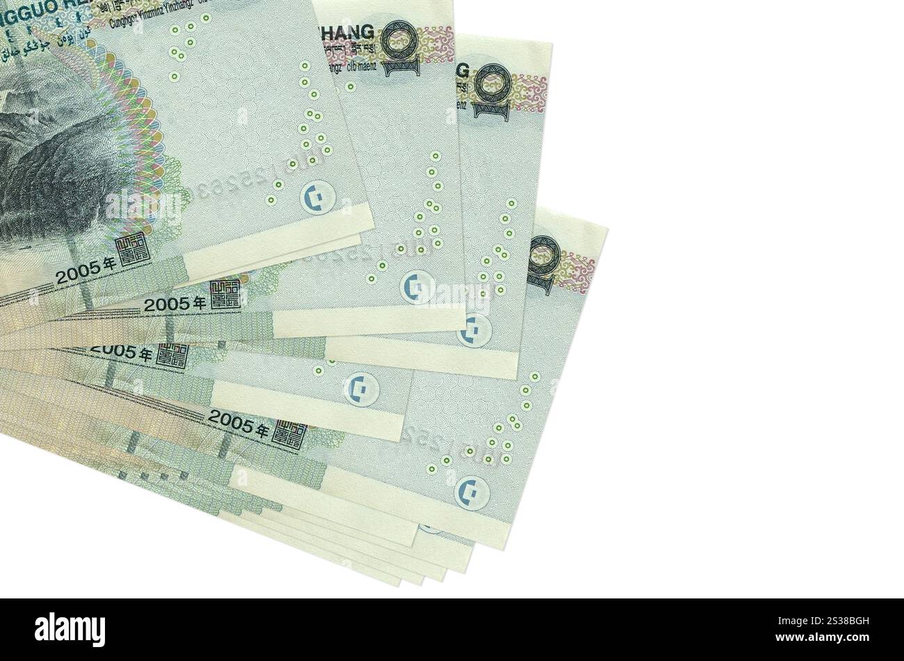 10 Chinese yuan bills lies in small bunch or pack isolated on white ...
