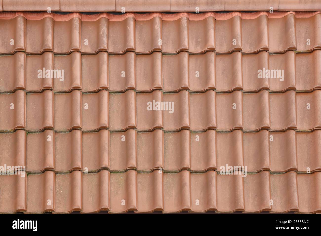 Architectural textured background of brown roof metal tile. Roof of a ...
