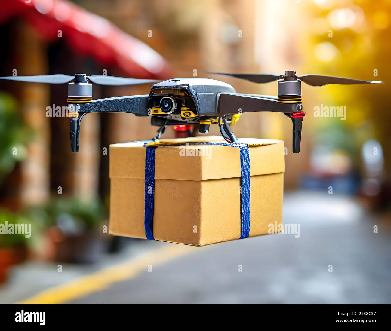 Drone flies and carries a cardboard box. Air transportation of cargo ...