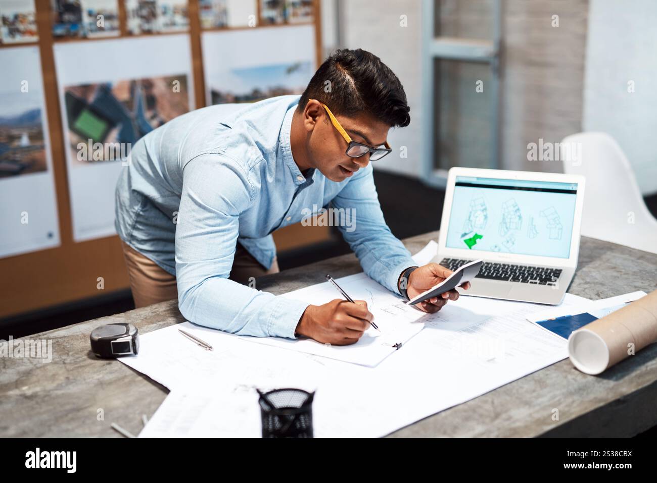 Architect, pencil and calculator for interior design, laptop blueprint ...