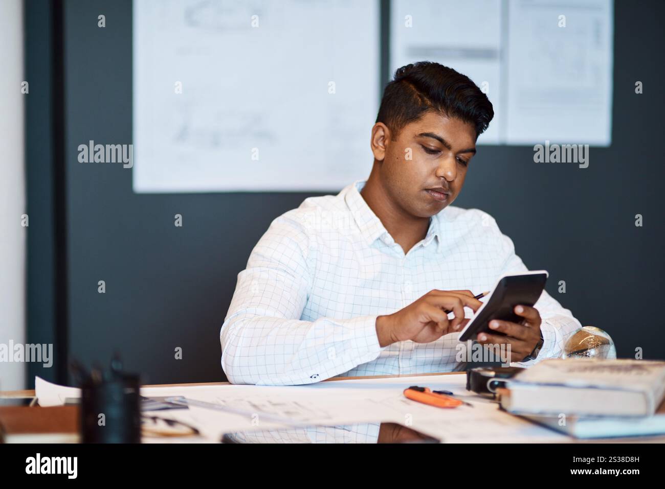 Plan, man and engineer with calculator in office for blueprint ...