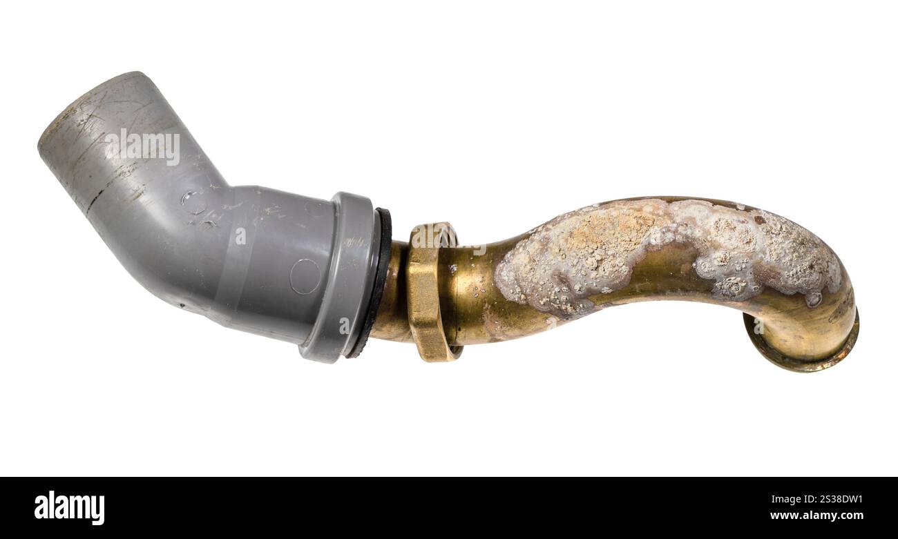 brass bathtub sewer pipe covered with corrosion with plastic elbow ...
