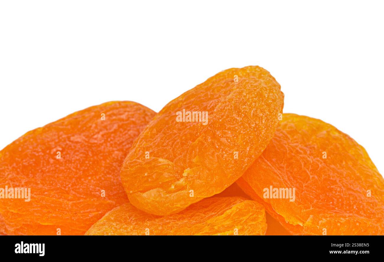 Dried apricots on a white background. Dried apricots Stock Photo - Alamy