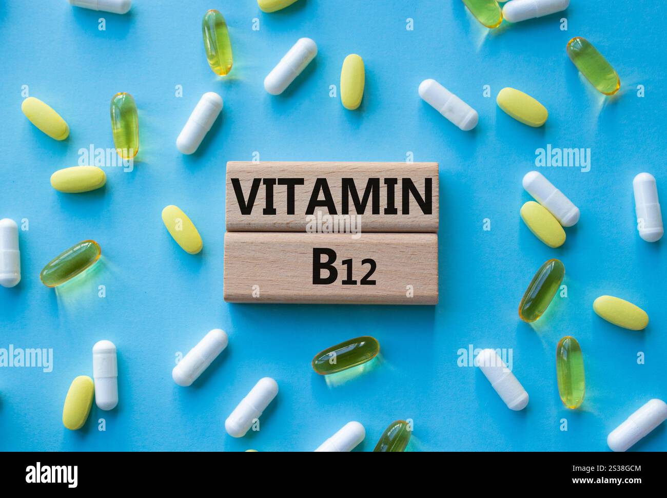 Vitamin B12 symbol. Concept word Vitamin B12 on wooden blocks ...