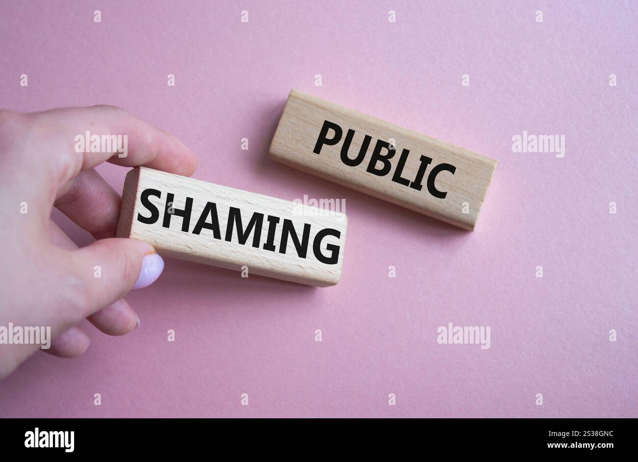 Public Shaming symbol. Concept word Public Shaming on wooden blocks ...